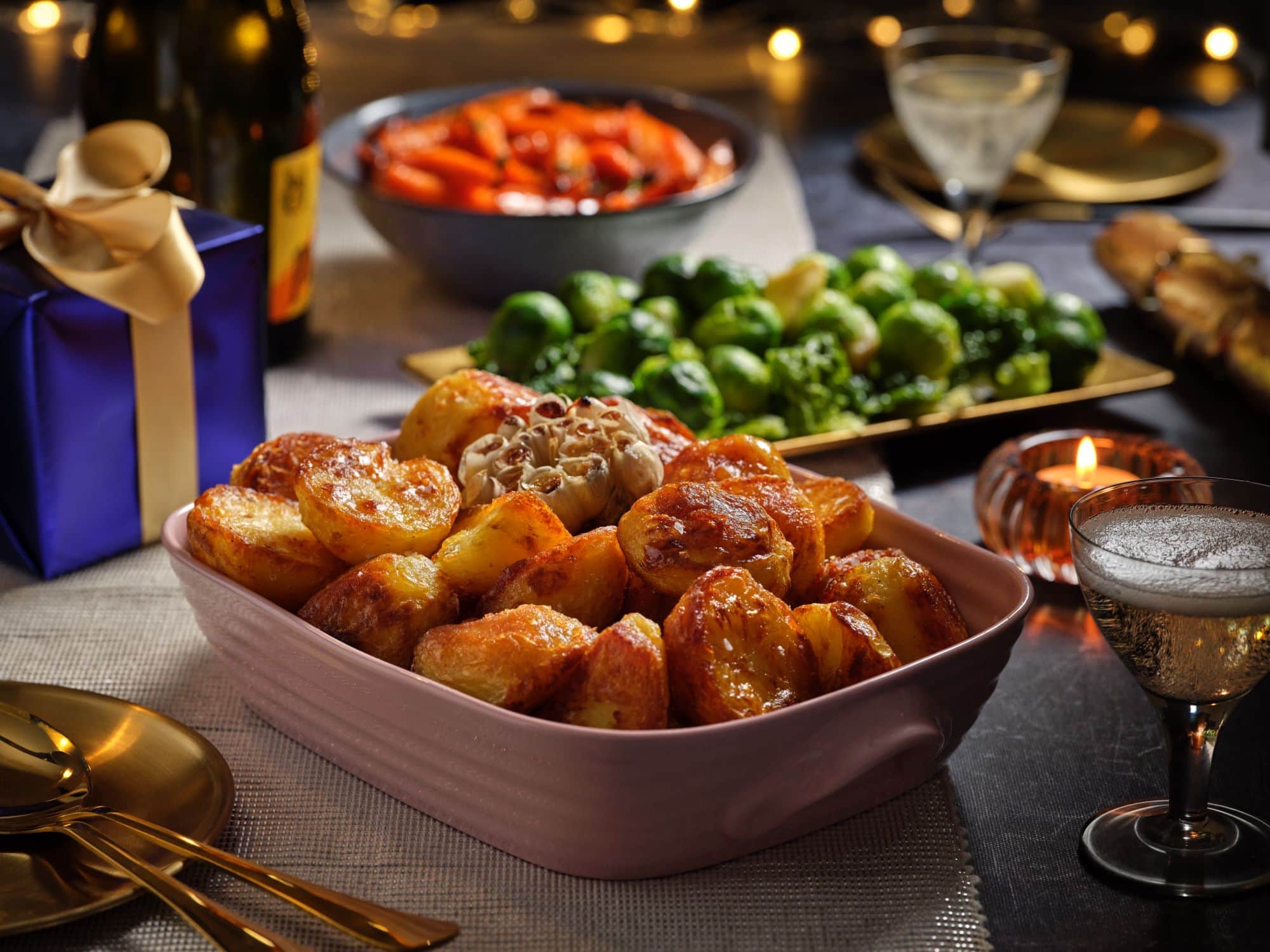 Best ever roasties with confit garlic