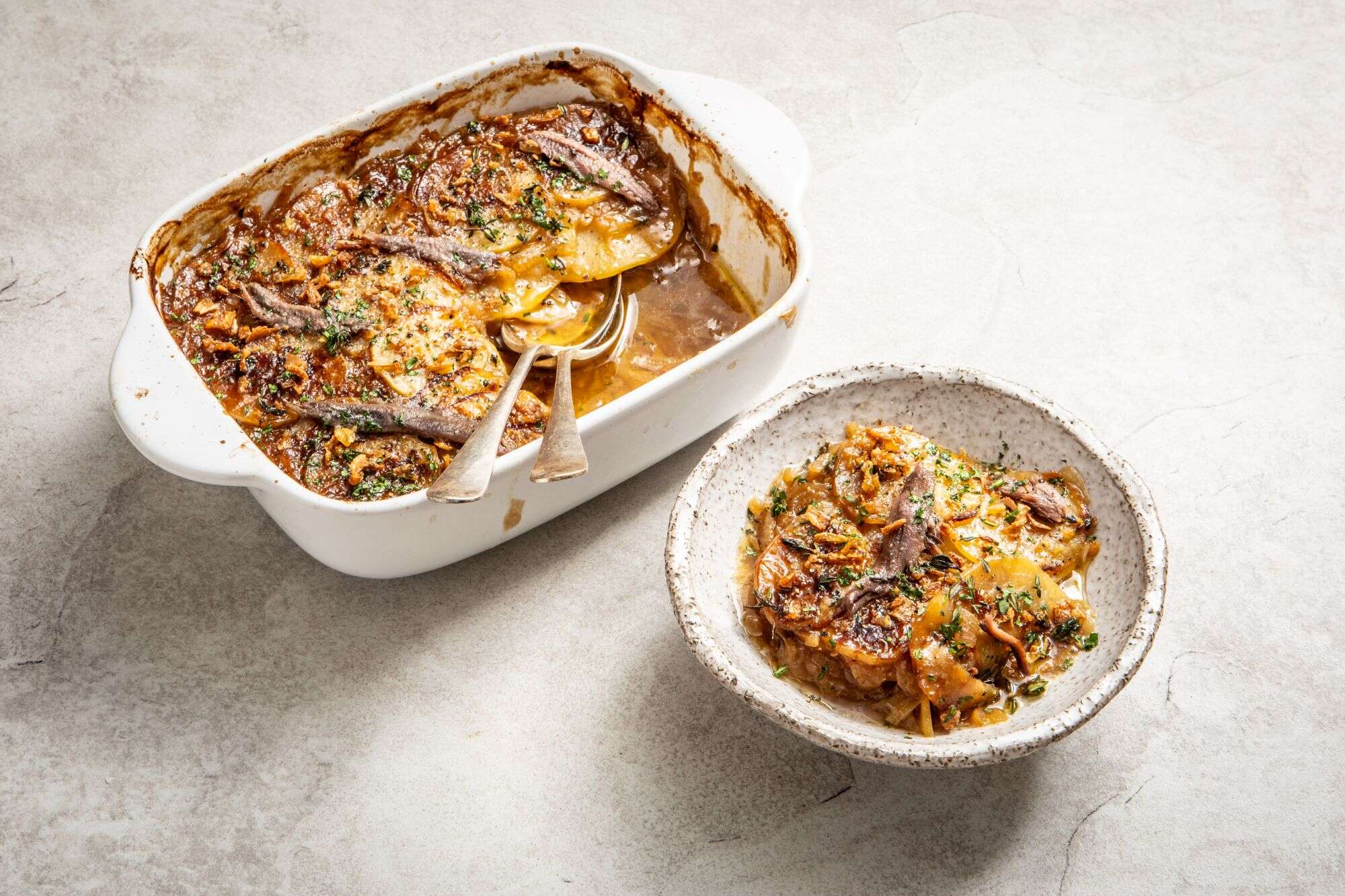 Boulangère potatoes with anchovy butter